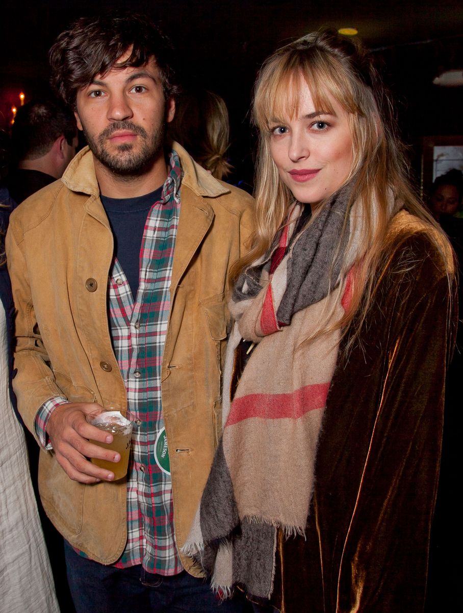 Dakota Johnson was seen 'cuddled up' with Role Model at dinner