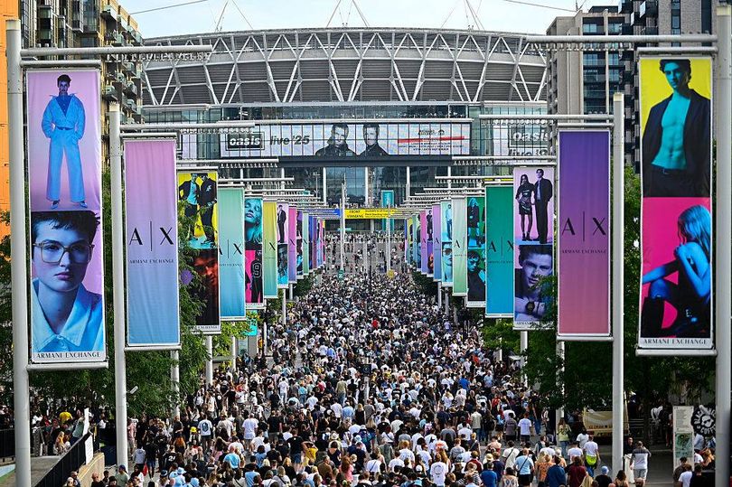 Oasis fan dies after falling 'from upper tier' of Wembley Stadium at ...