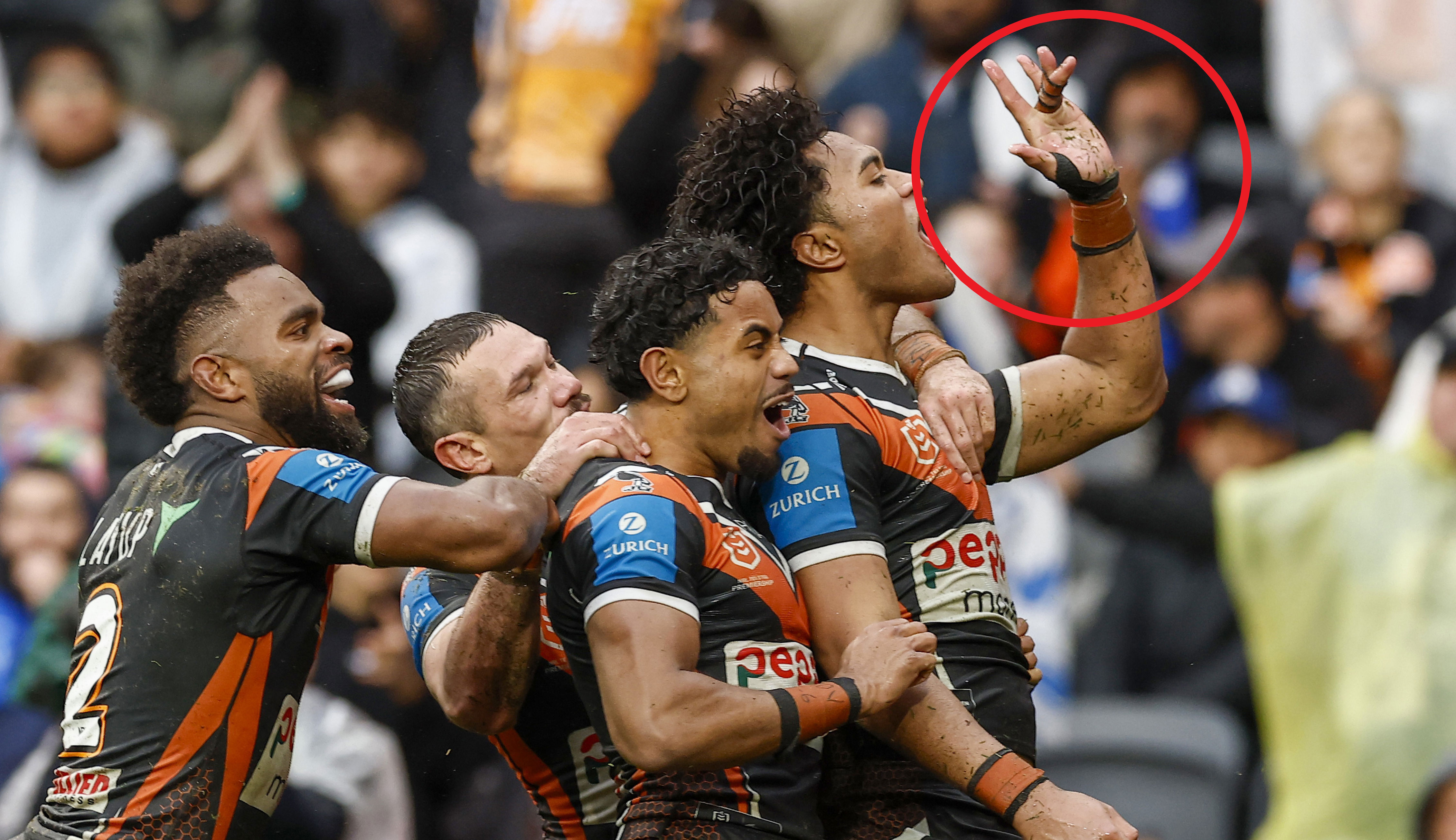 NRL whacks Tigers over controversial hand gesture