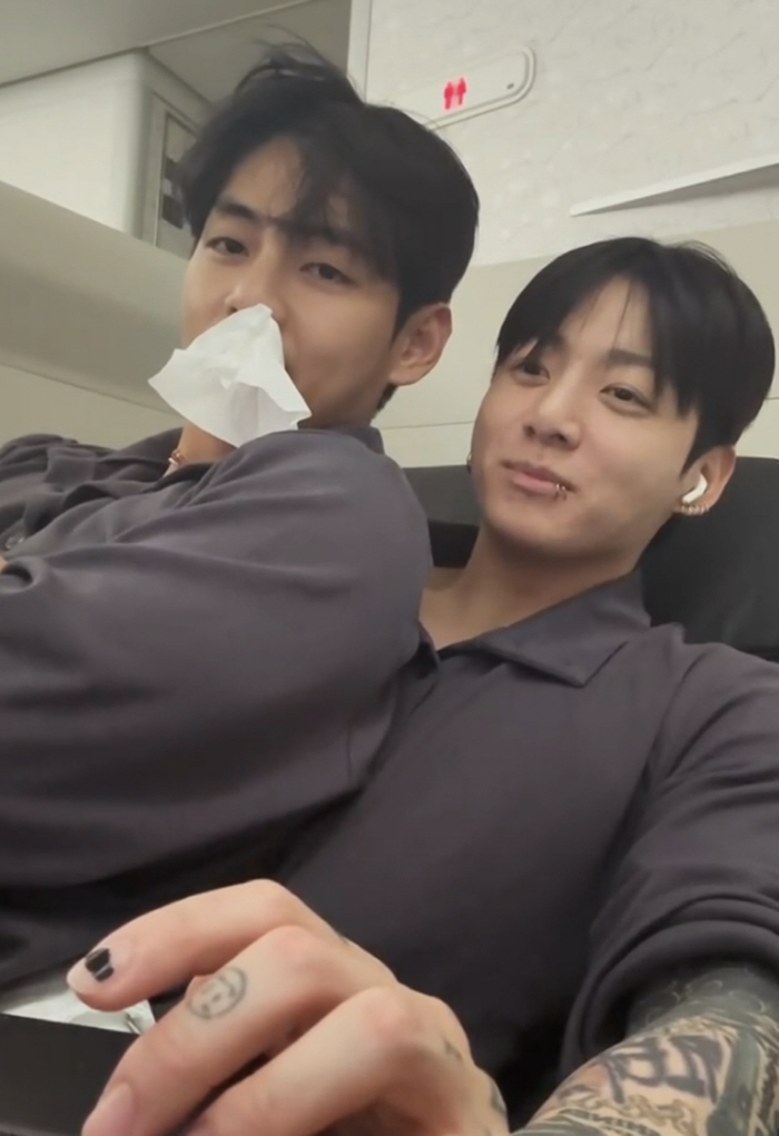 BTS V with tissue in his nose gets away and then gets closer to his ...