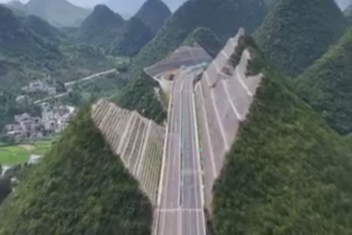Engineers slice mountain in half to make way for world’s tallest bridge