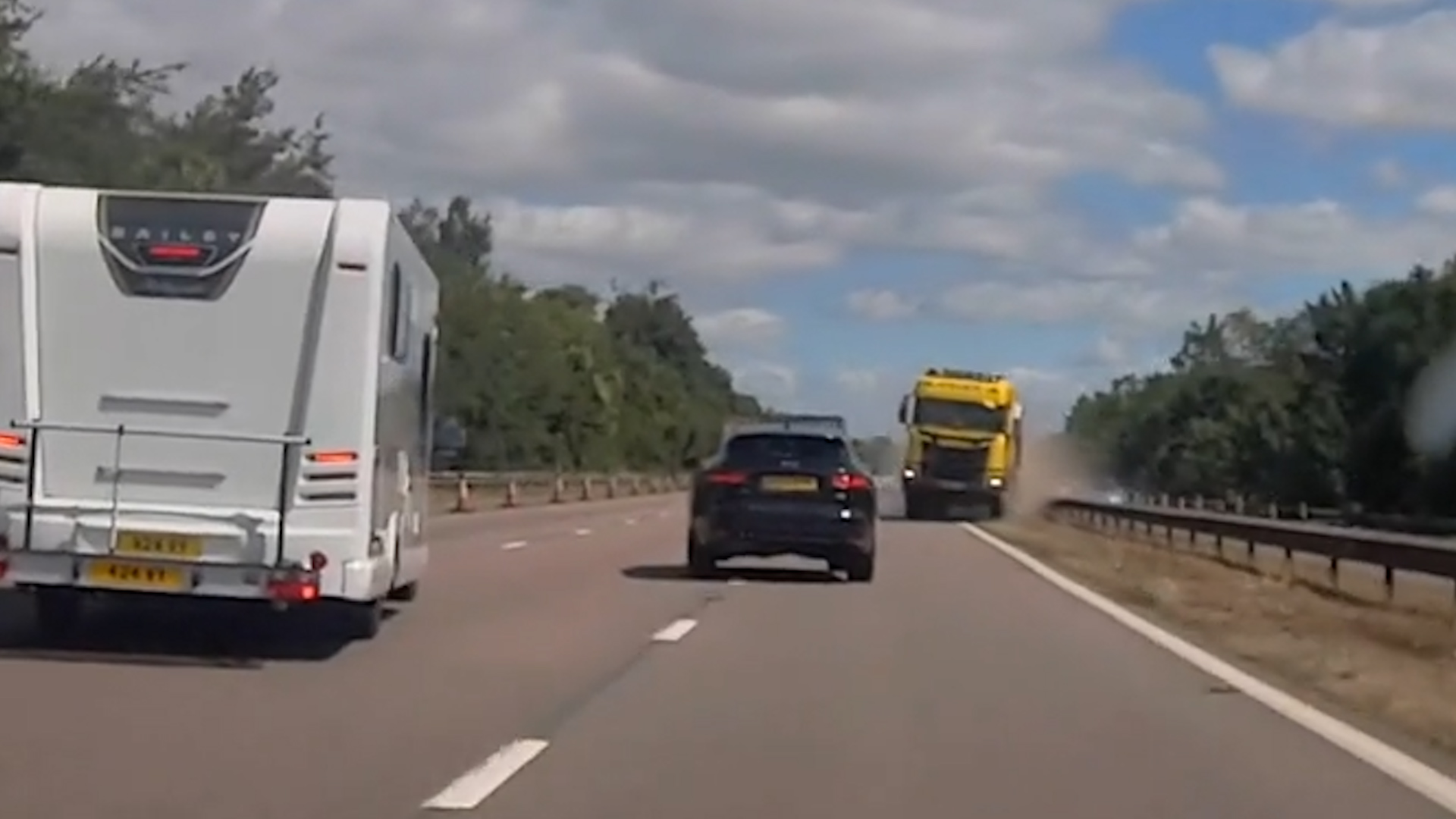 Lorry careers onto wrong side of M5 terrifying Porsche driver