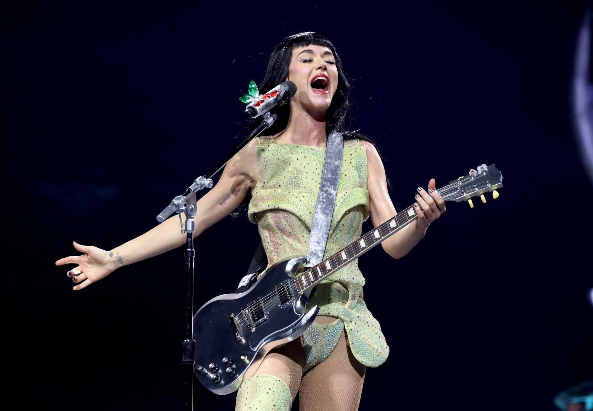Katy Perry springs into action after fan collapses