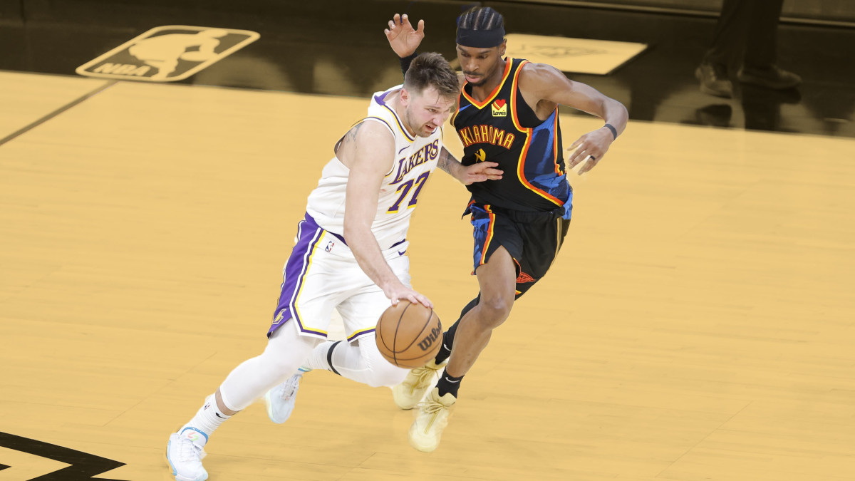 "I don't think it's an open-and-shut case" - Zach Lowe thinks Luka will ...