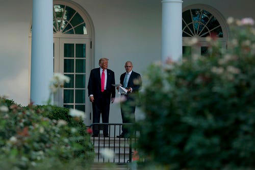 President Trump relishes new 'very white' paved-over Rose Garden