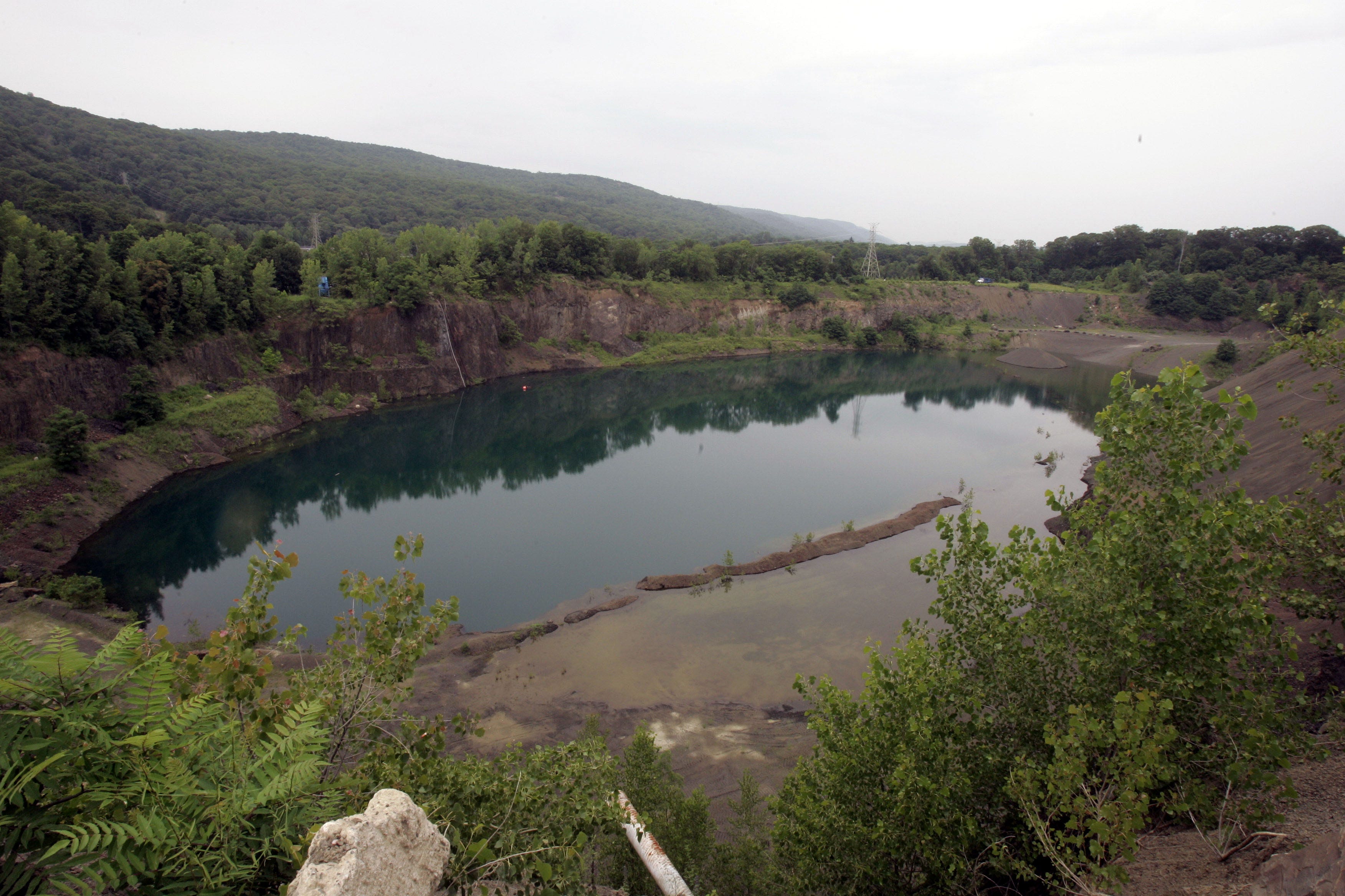 Police retrieve body found floating in Suffern's former Tilcon quarry ...