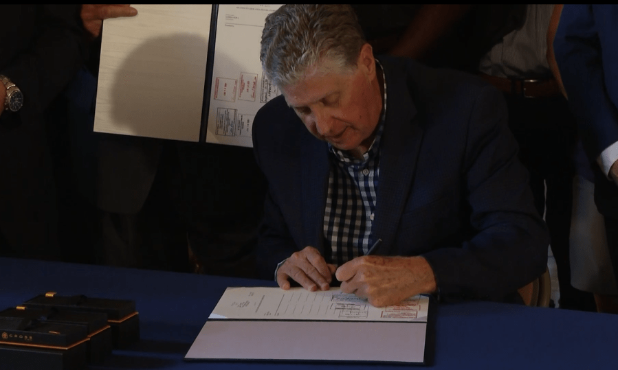 RI’s minimum wage to surpass Mass. in 2026; experts say it’s still well ...