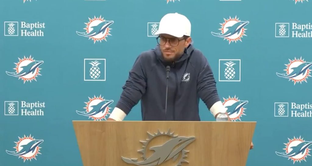 Dolphins coach embraces death