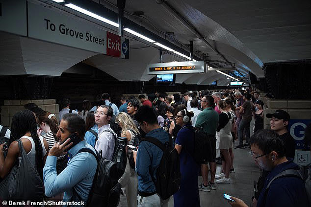 Terrifying moment panicked passengers flee subway after fire breaks out ...