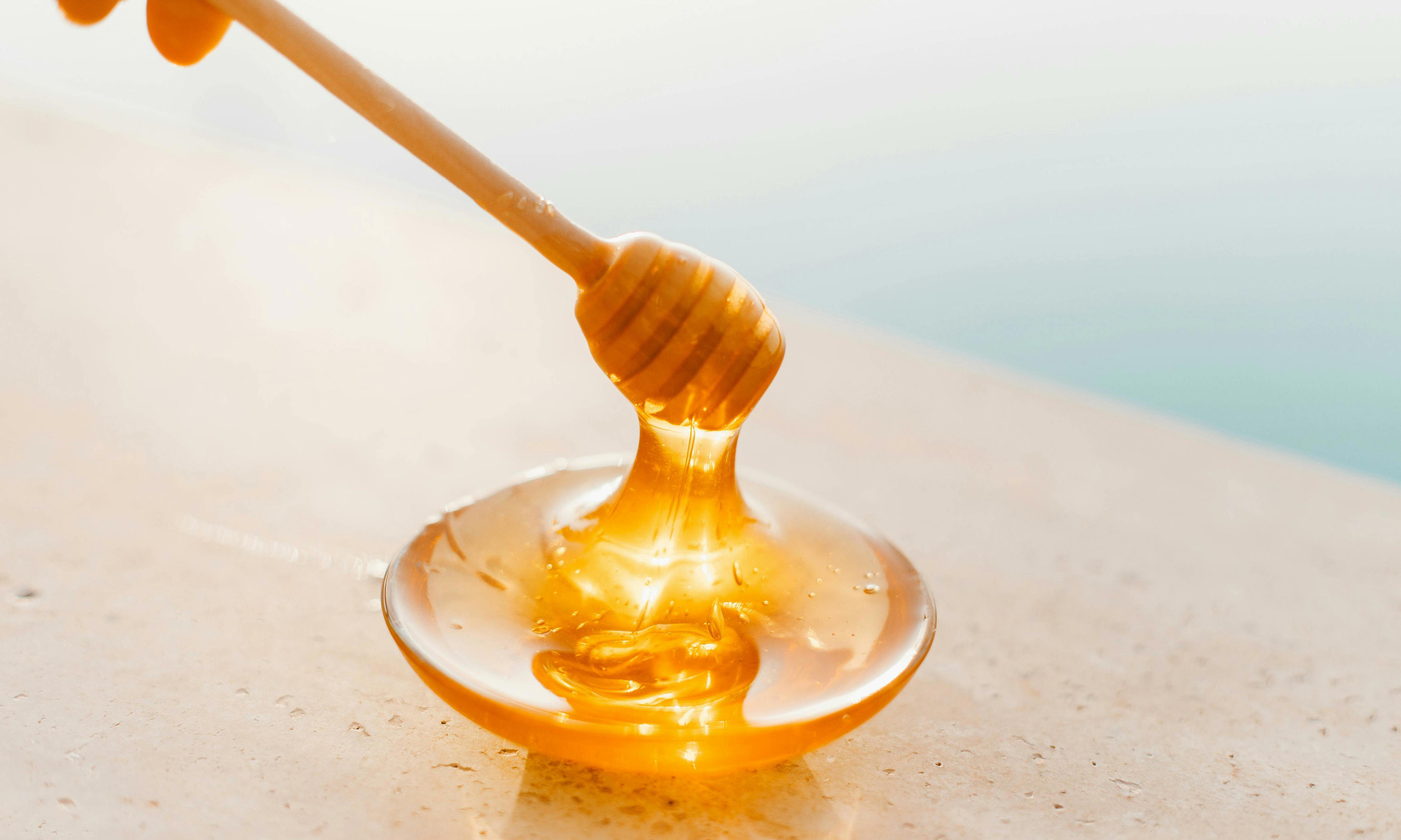 Who should be cautious when consuming honey?