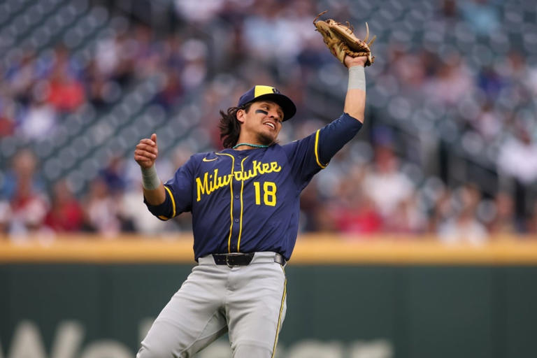 Isaac Collins' 3-run homer eases Brewers past Braves