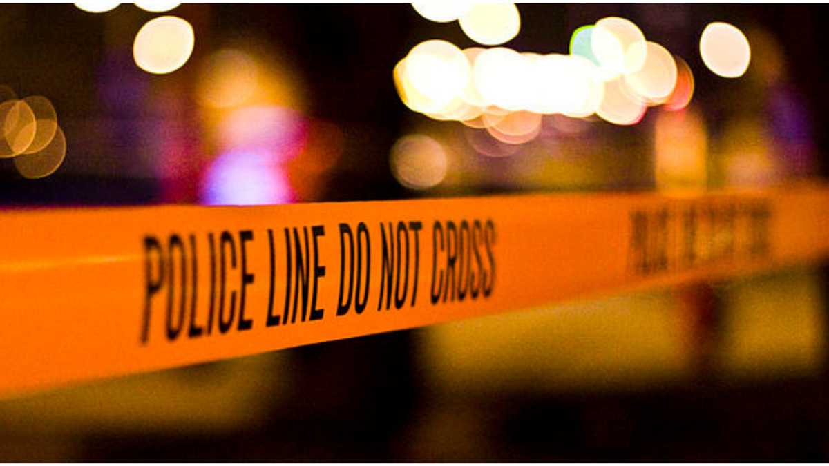 Motorist discovers body hidden in animal feed sacks