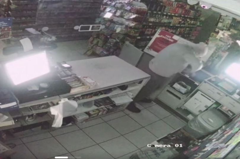 Masked thief caught on camera raiding Scots post office of cash and ...