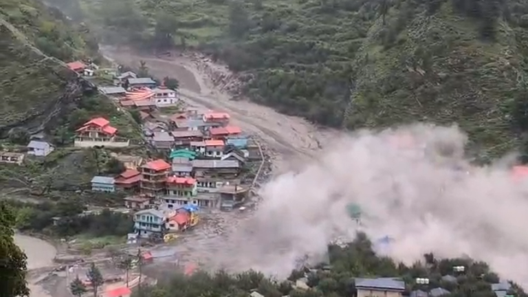 Dozens believed to be trapped under rubble after flash floods in ...