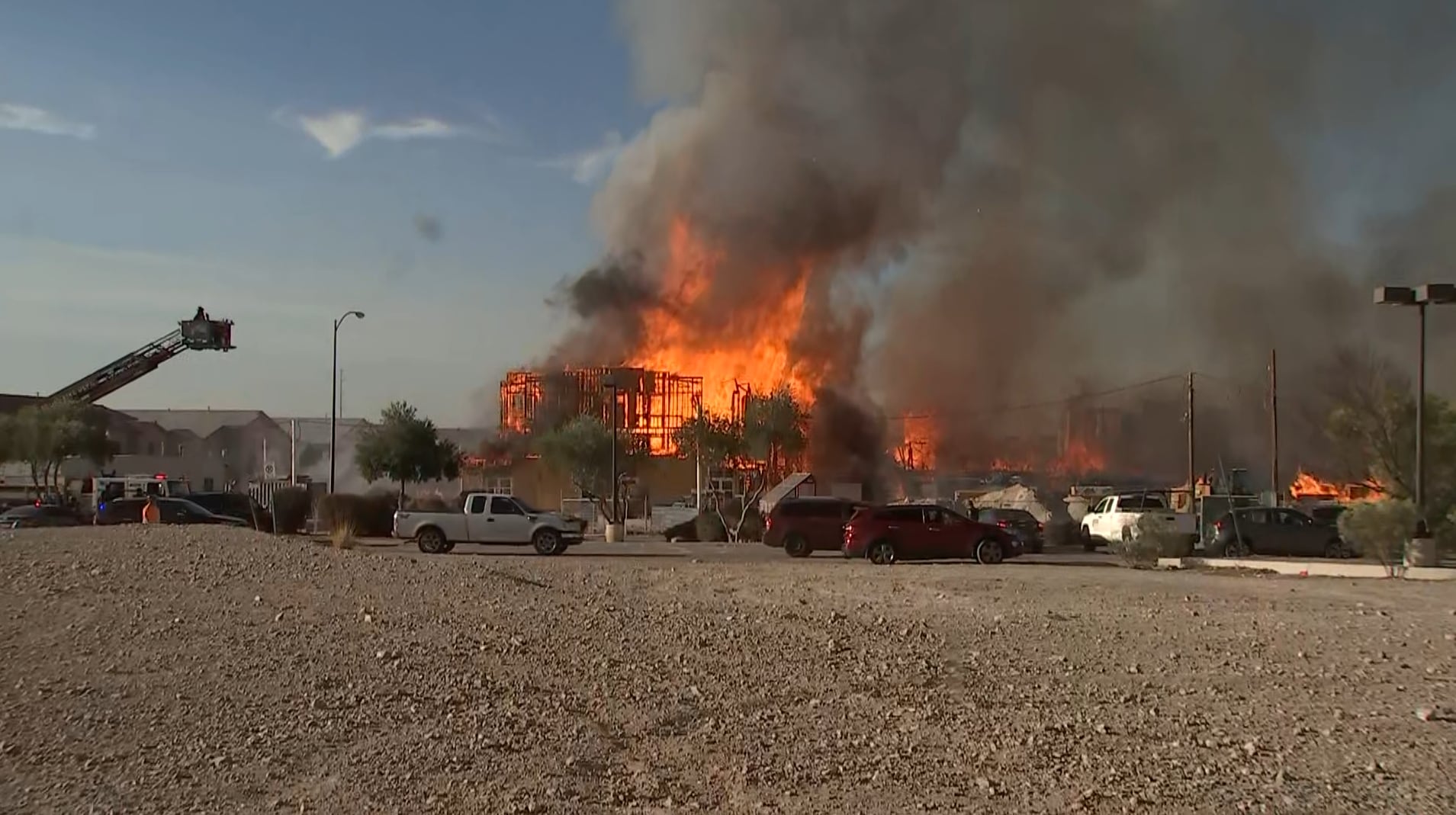 Massive fire contained after charring apartment construction site in ...