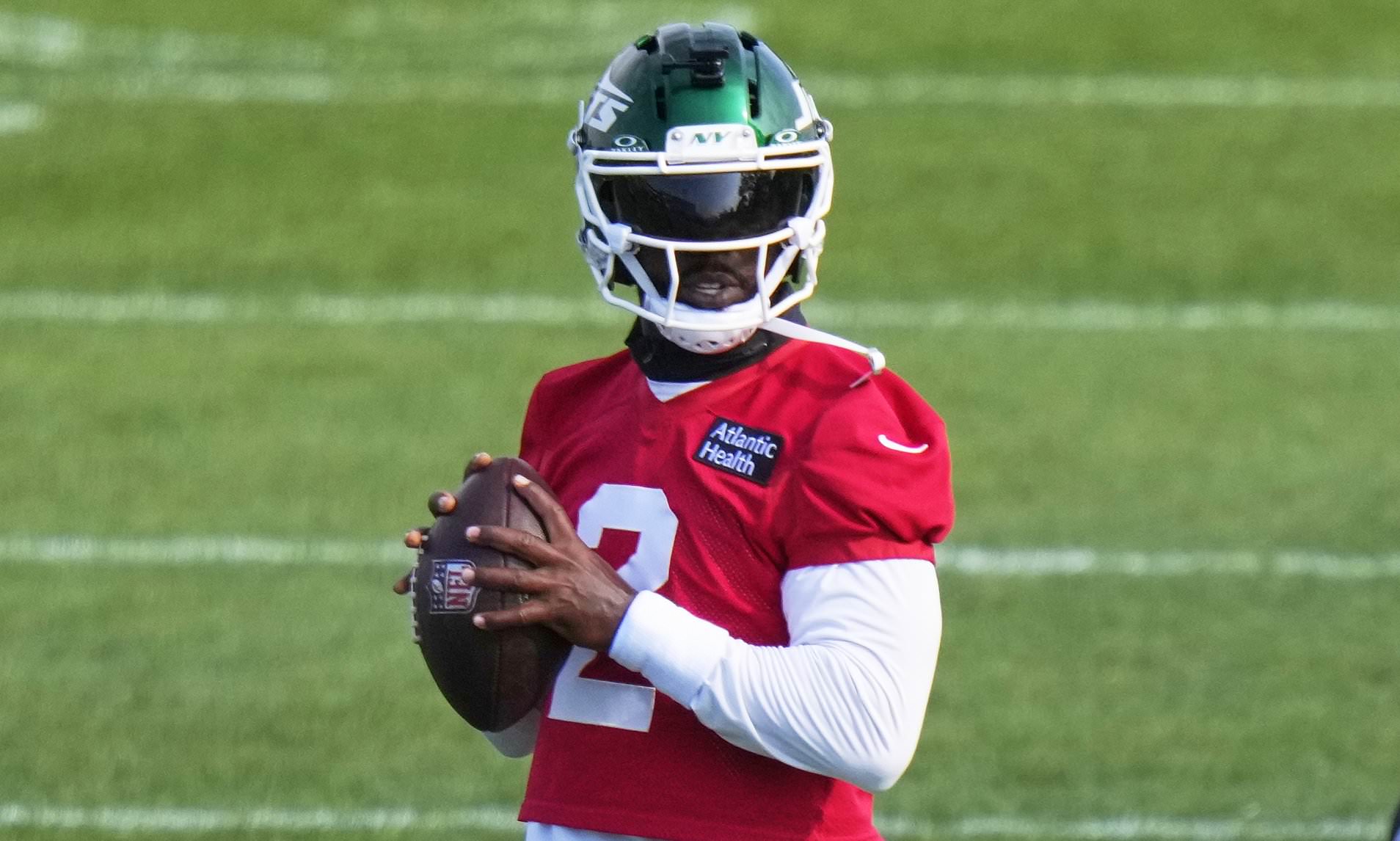 NFL quarterback being assessed for a knee injury as his team faces a ...