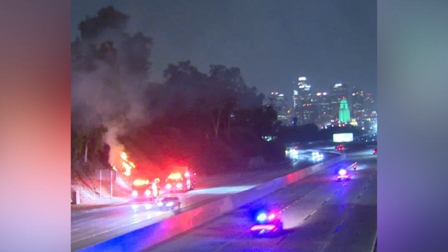Speeding driver races by freeway fire during pursuit before abandoning ...