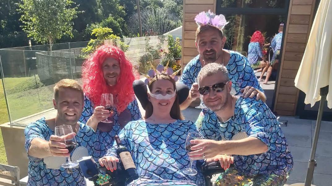 Husband transforms into mermaid for MND charity