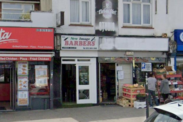 Woman uses wine bottle as weapon as she trashes Downham barber shop