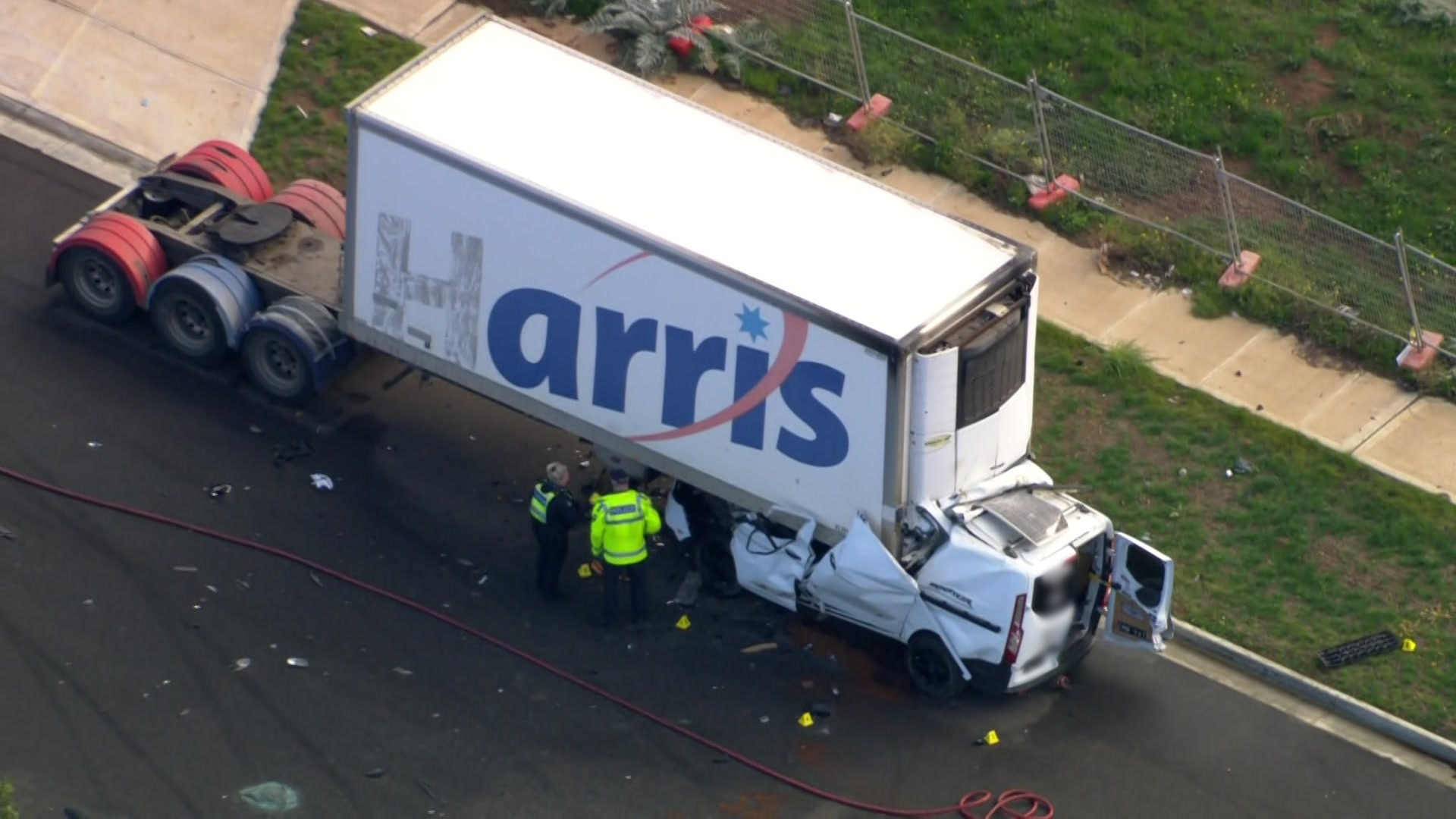 One person dead after van crushed under truck in crash at Ravenhall