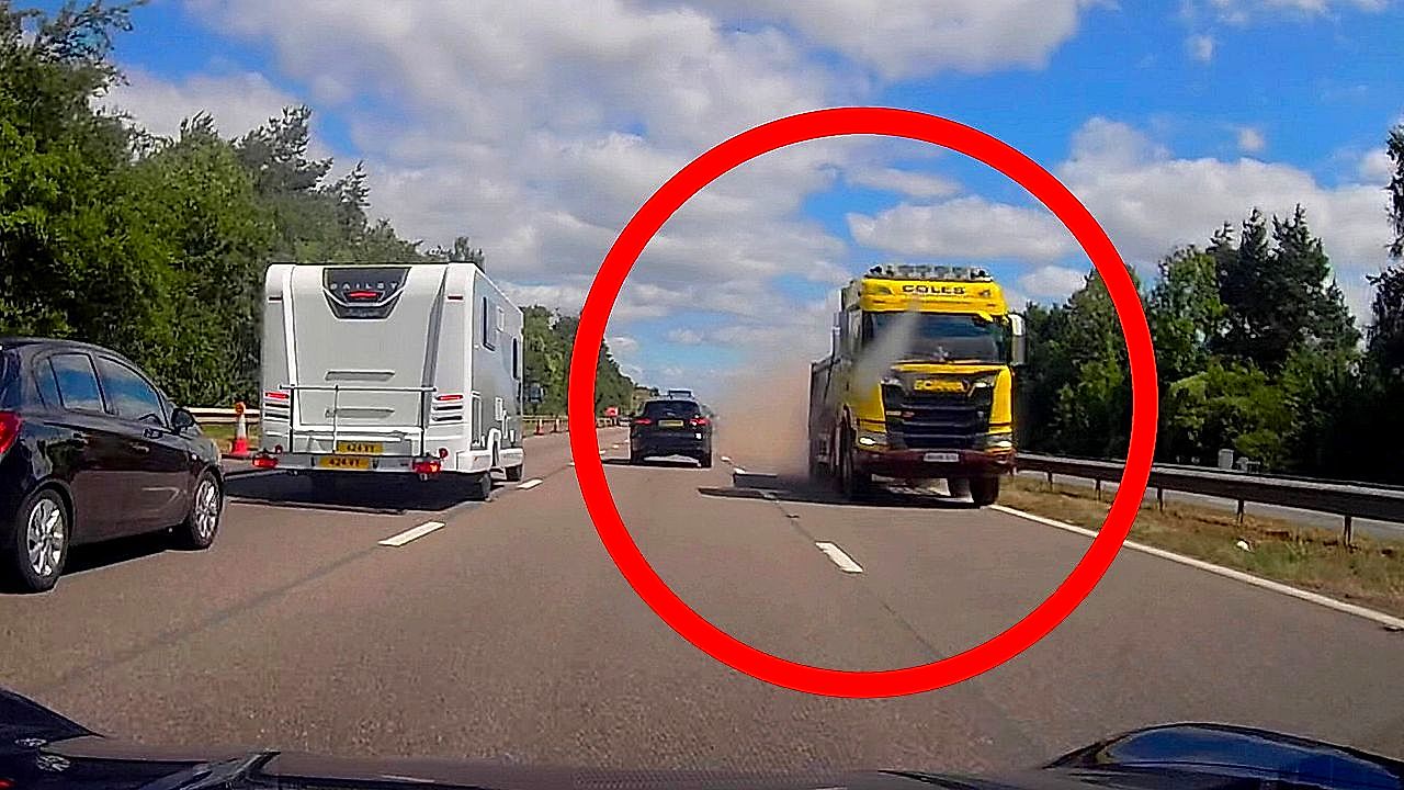 Porsche driver narrowly escapes truck barreling into oncoming traffic