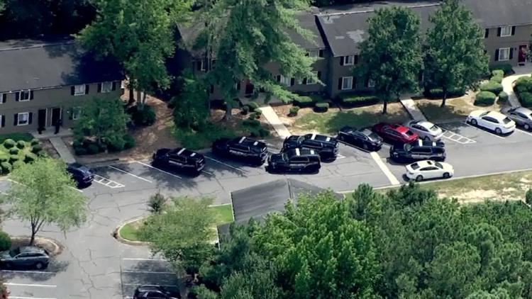 Multiple DeKalb Co. Police officers along Pleasant Point Drive