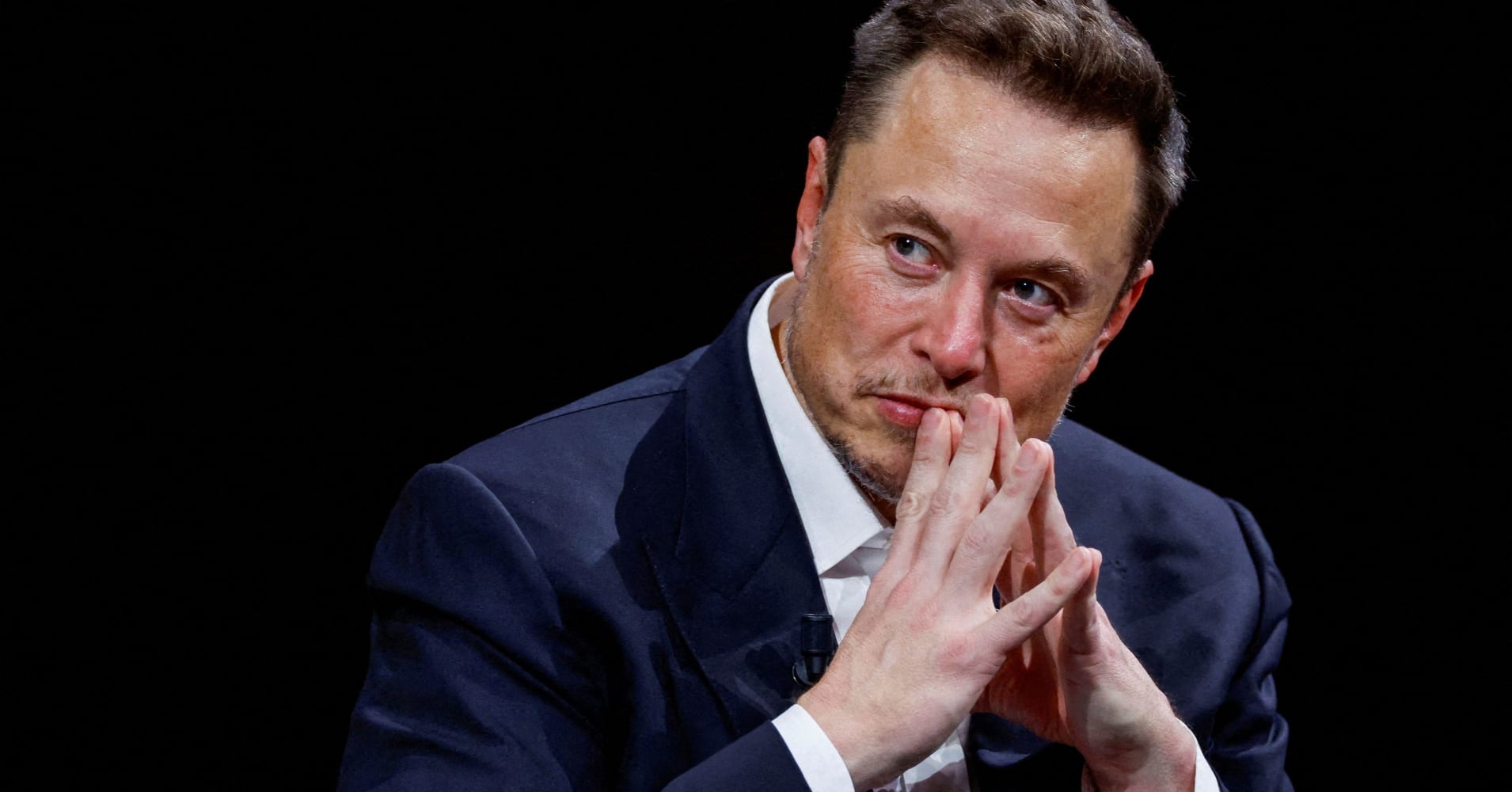 Tesla shares gain as Elon Musk reveals rare $1 billion stock buy in ...