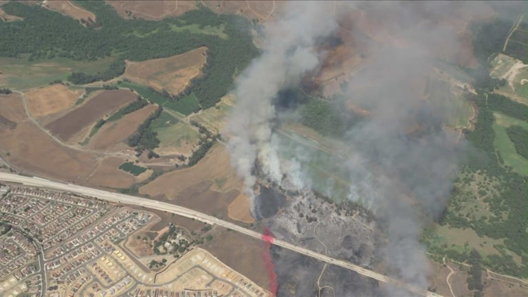 Firefighters battle fast-moving brush fire in Chino Hills