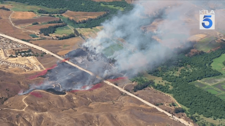 Firefighters battle fast-moving brush fire in Chino Hills