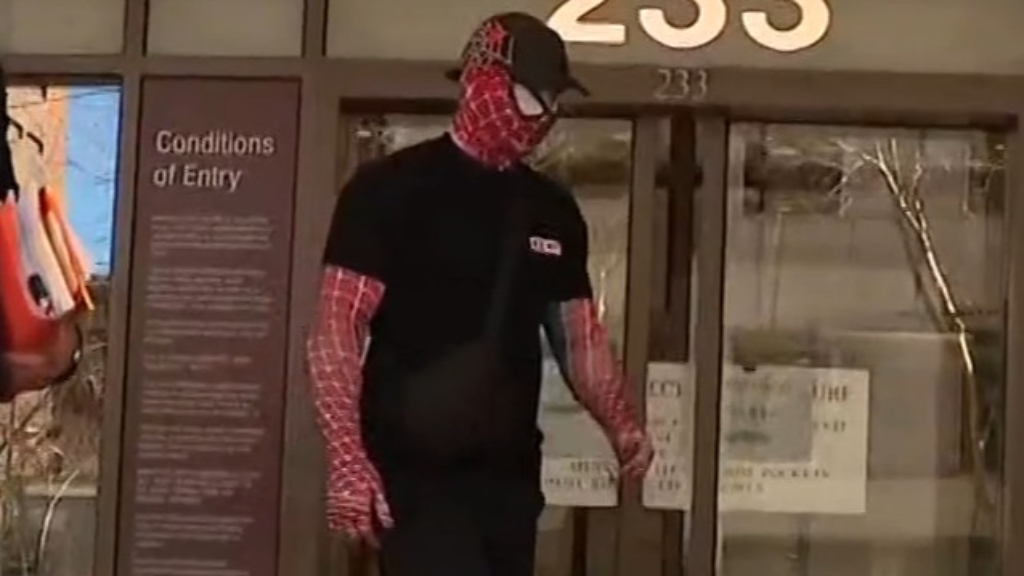 Accused vandal performs bizarre Spider-Man stunt outside court