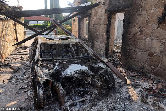 Out-of-control Cyprus wildfires bears down on tourist town