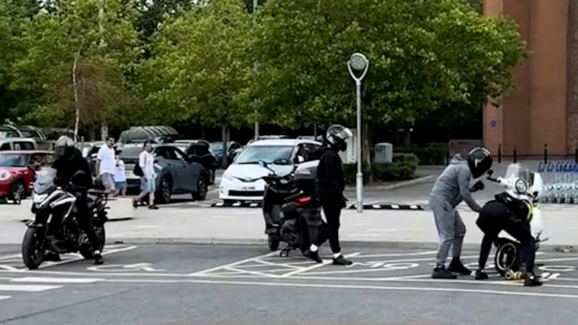 Brazen thieves use angle grinder to steal scooter in broad daylight ...