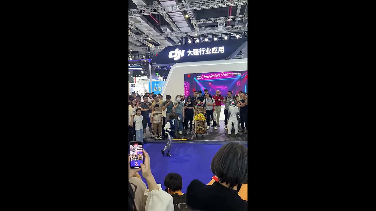 Robot goes haywire after falling during street dance performance in China