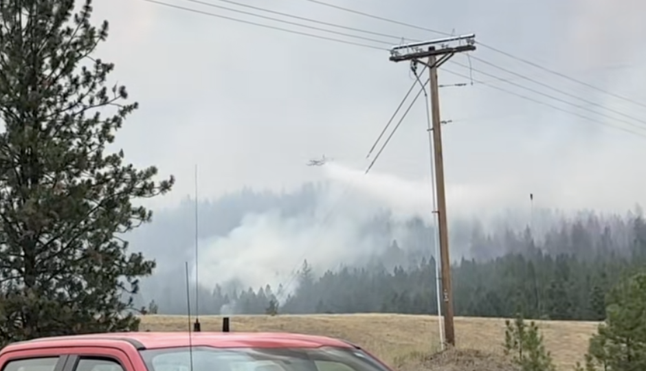 Washington Firefighters Battle Blazing Lake Spokane Fire