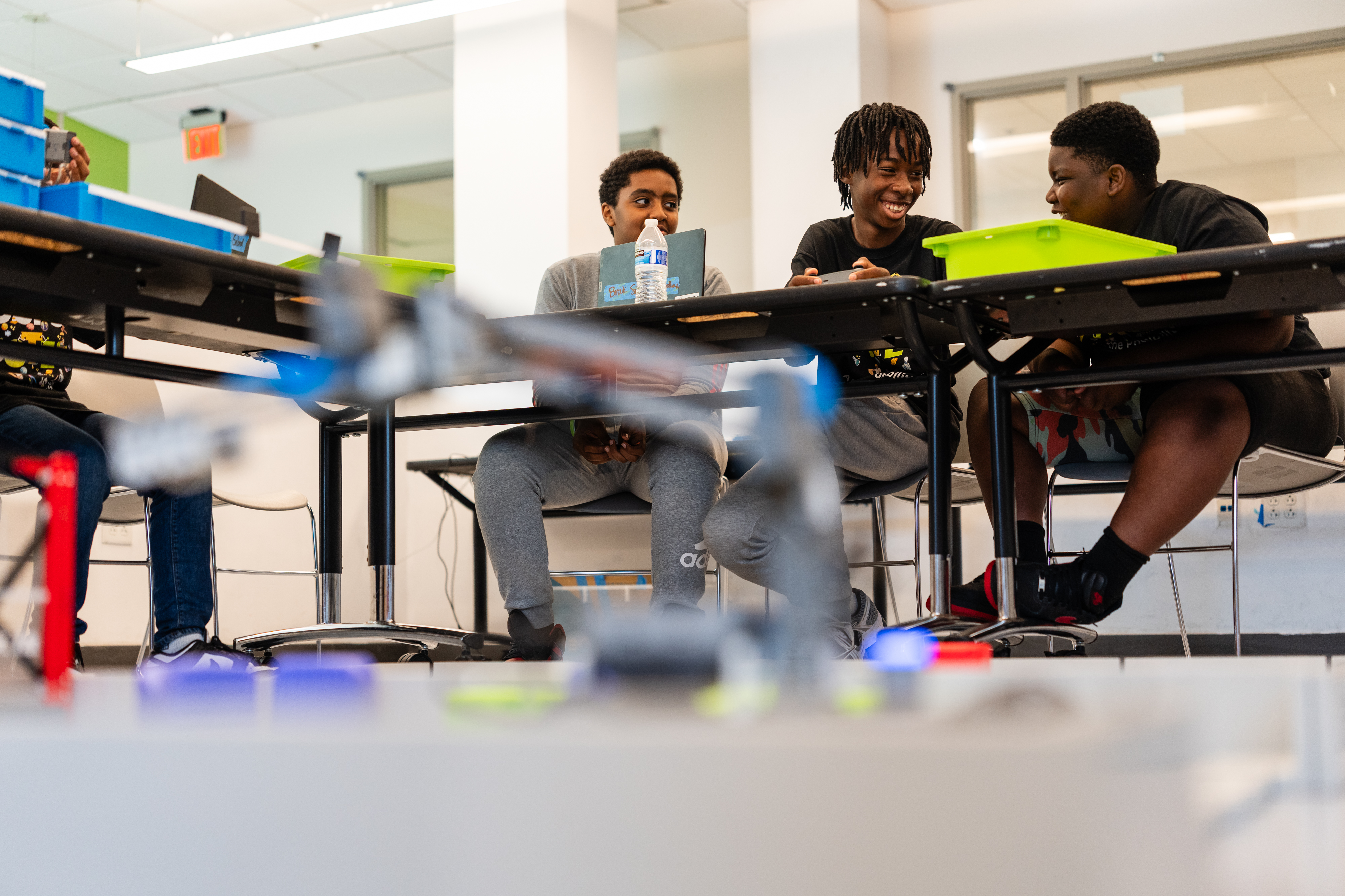 At this summer camp, kids build soccer-playing, relay-racing robots