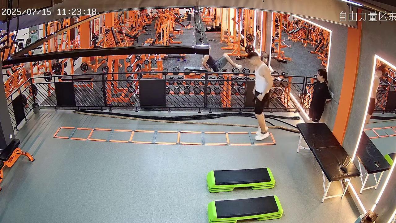 Gymgoer cheats while trainer leads the way with ladder squat jumps