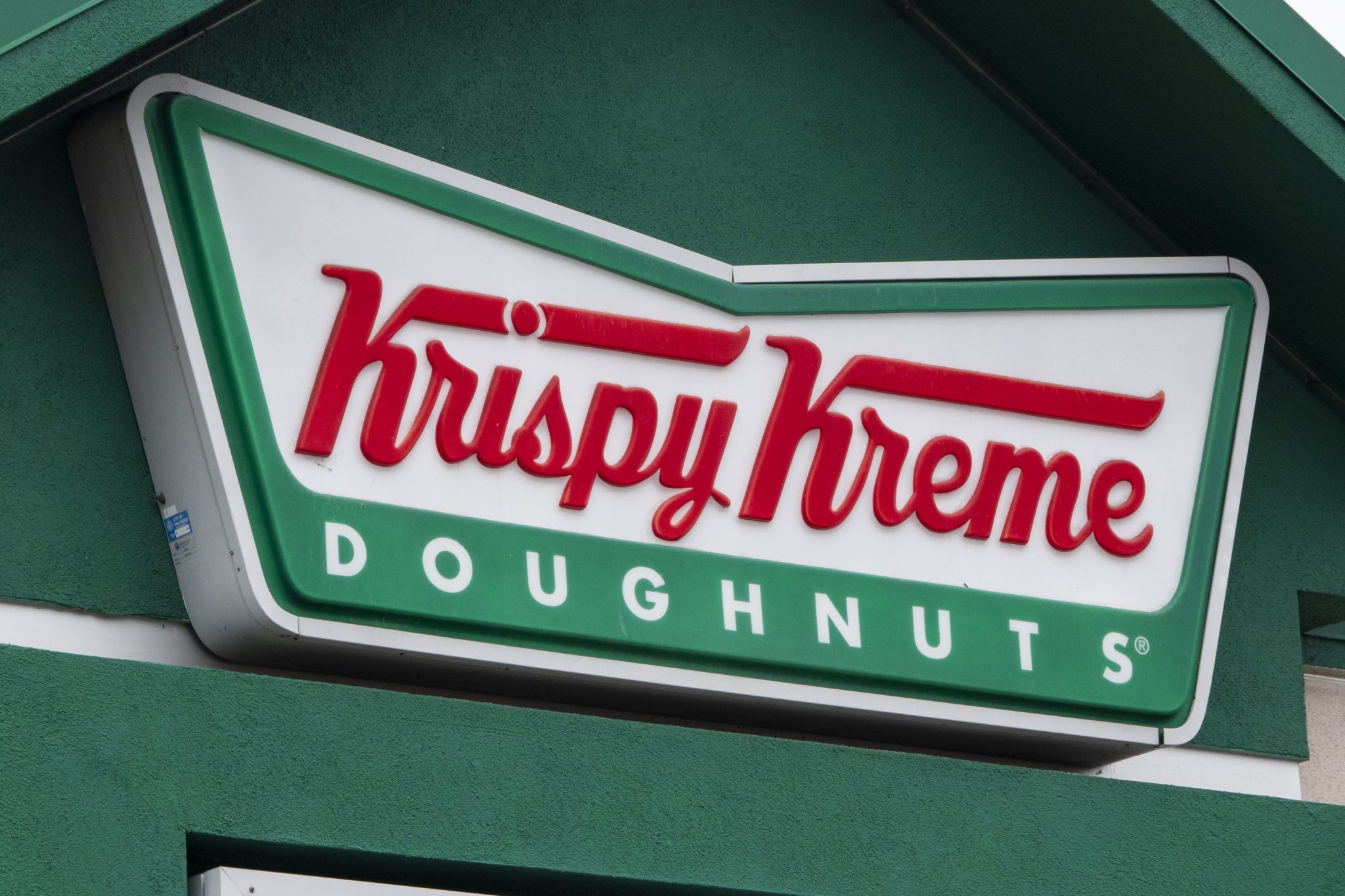 Krispy Kreme will give you a free doughnut in August—if you’re wearing ...