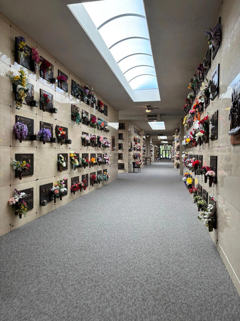 Graveyard within a graveyard: Where some silk flowers and trinkets go ...