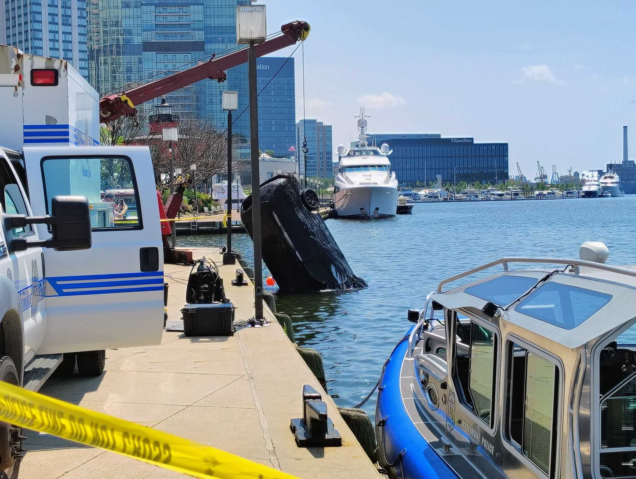 Body found inside vehicle pulled from harbor