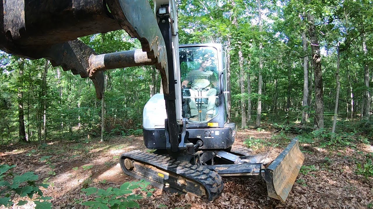 Mini Excavator Land Clearing Ridgetop for New Remote Campsite