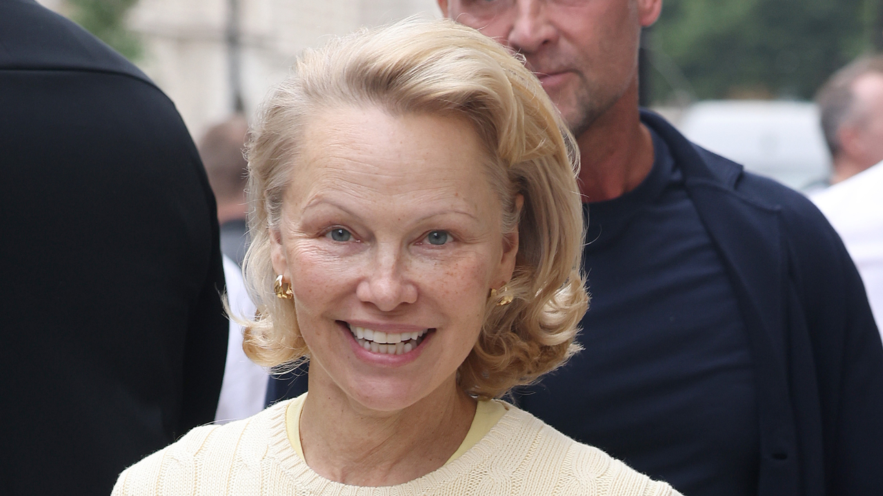 Pamela Anderson embraces the butter yellow trend as she steps out in ...