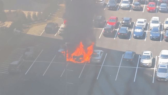 Huge Fireball as Car Explodes in Parking Lot