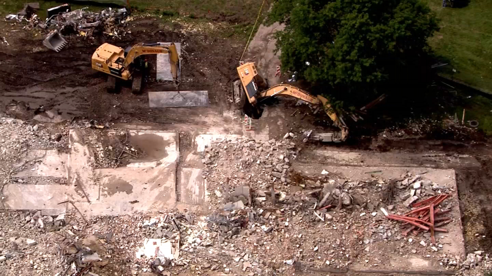 Person ‘extricated' after being trapped inside fallen crane during ...