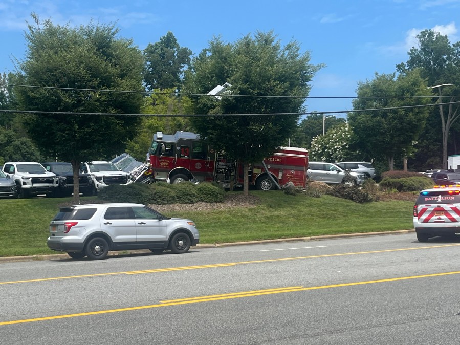 Fire truck crashes into parked vehicles at Vann York Chevrolet Buick ...