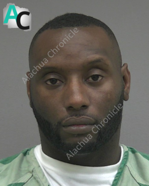 Gainesville man arrested for pointing gun at co-worker, smashing car window