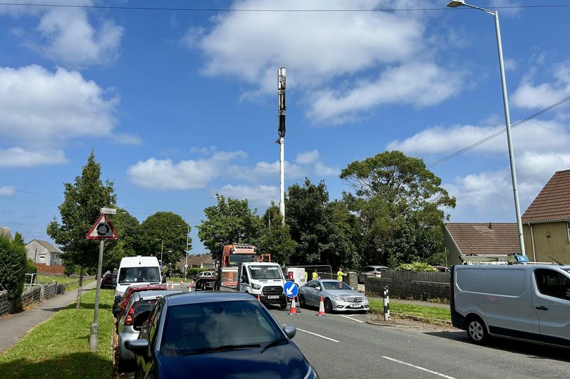 Residents evacuated after communications mast bursts into flames