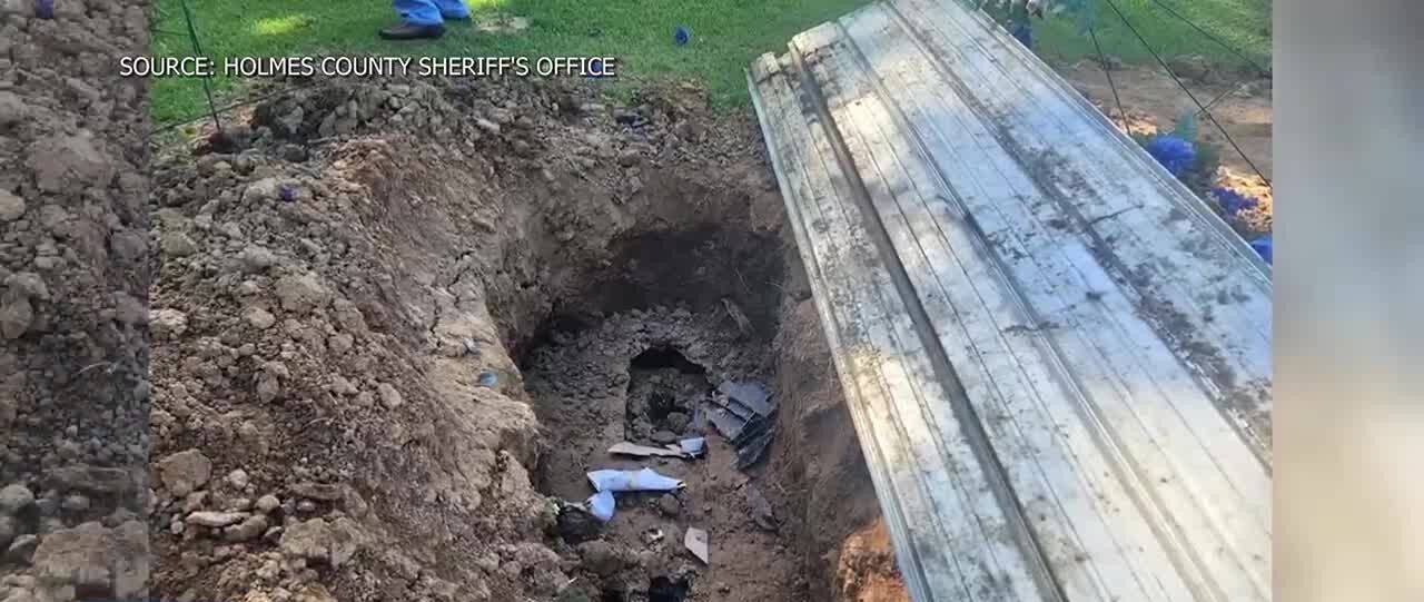 Suspect wanted for digging up grave in Holmes County