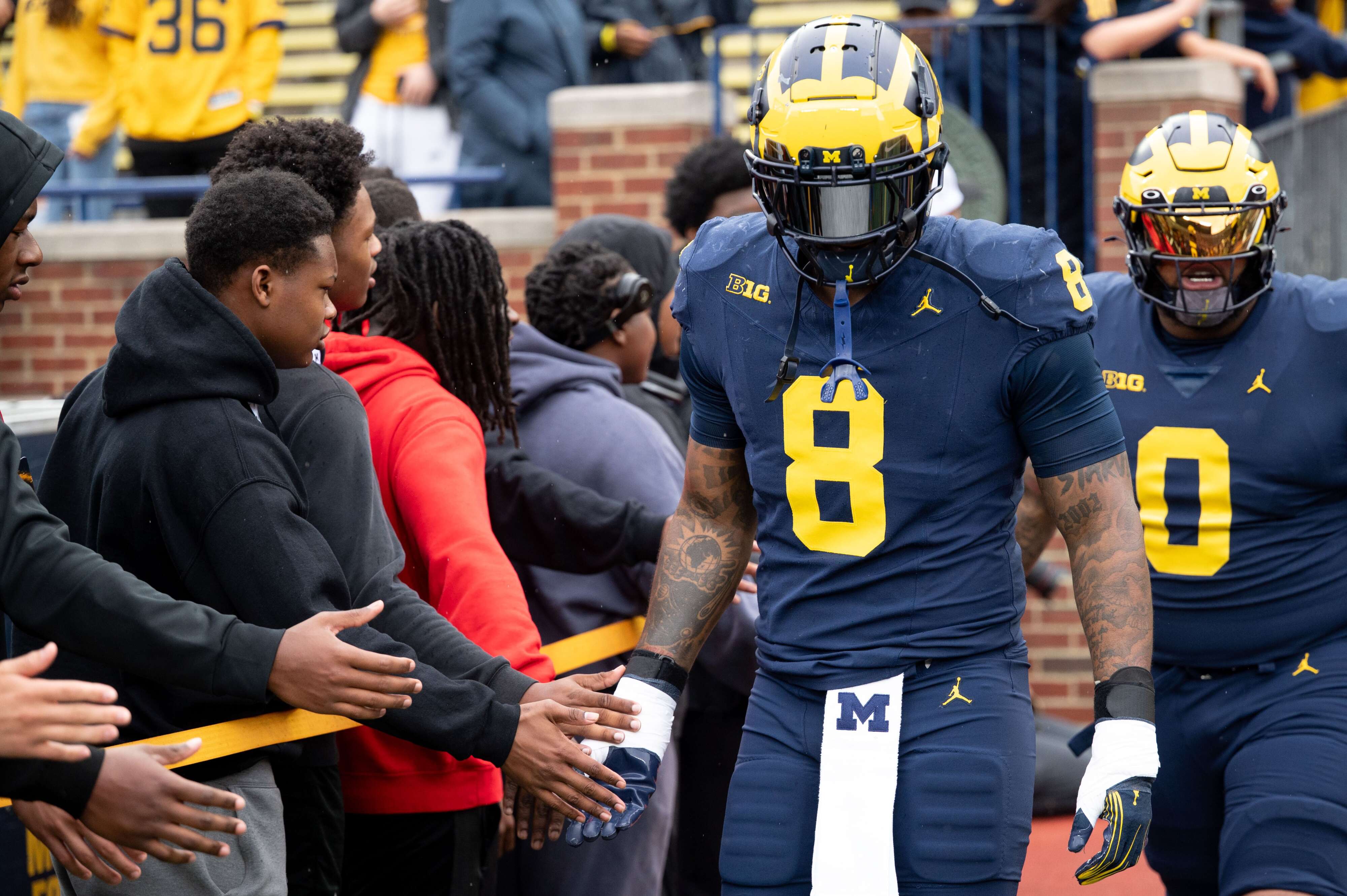 Derrick Moore, at the center of the Michigan-Ohio State melee, has a ...