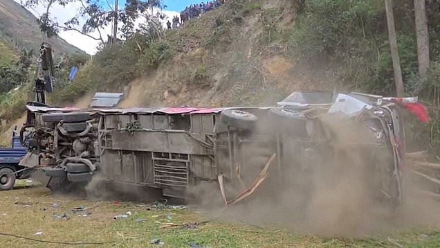 Rescue workers search wreckage as bus crash kills 18 in Peru