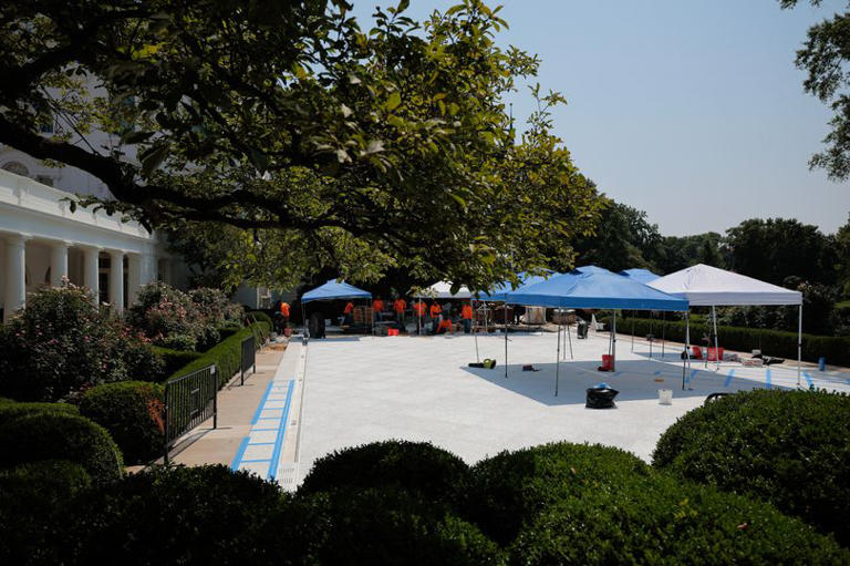 Trump and Melania slammed for ‘tacky’ White House rose garden redesign as new images reveal concrete